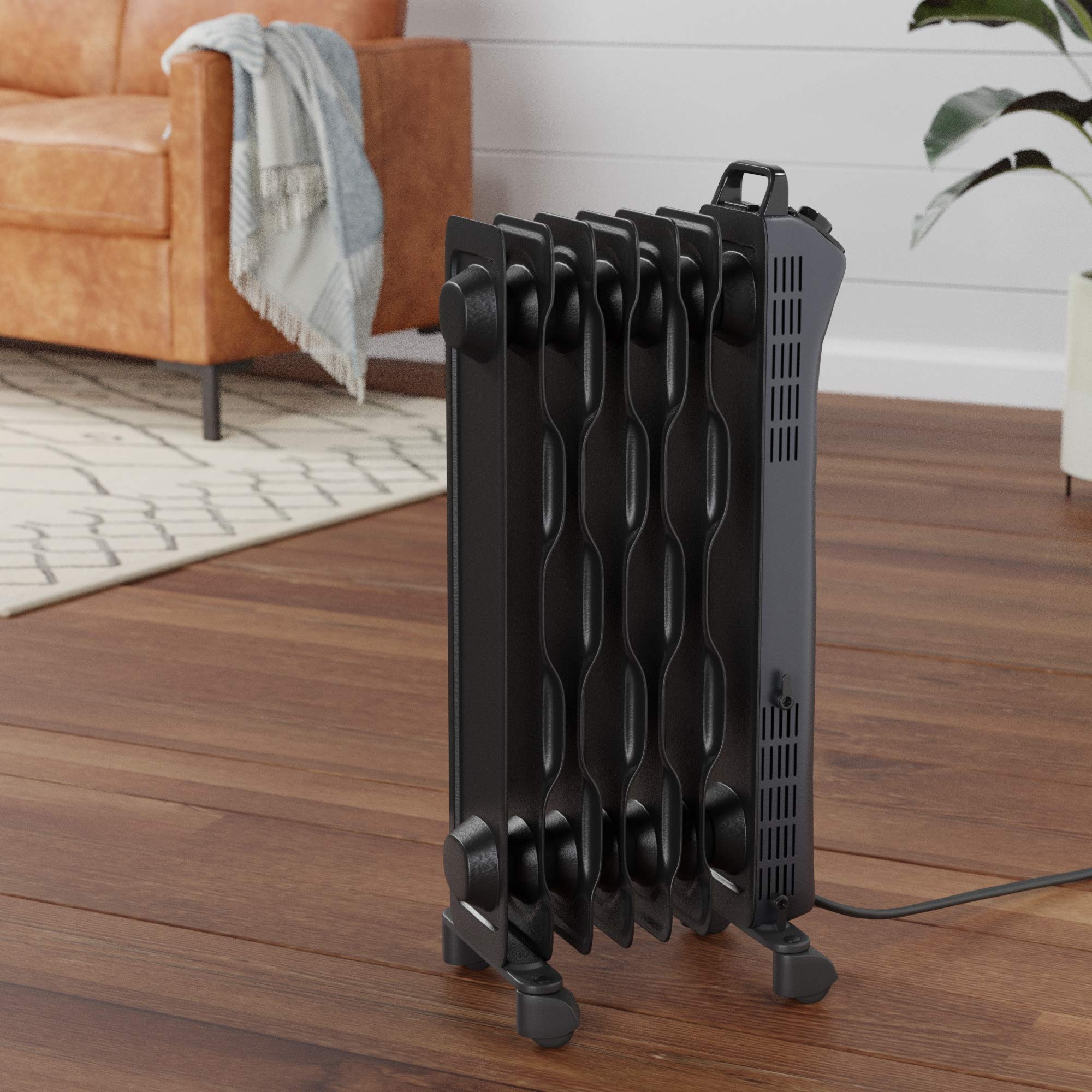 $12.46 Like New - Amazon Basics Portable Radiator Heater with 7 Wavy ...